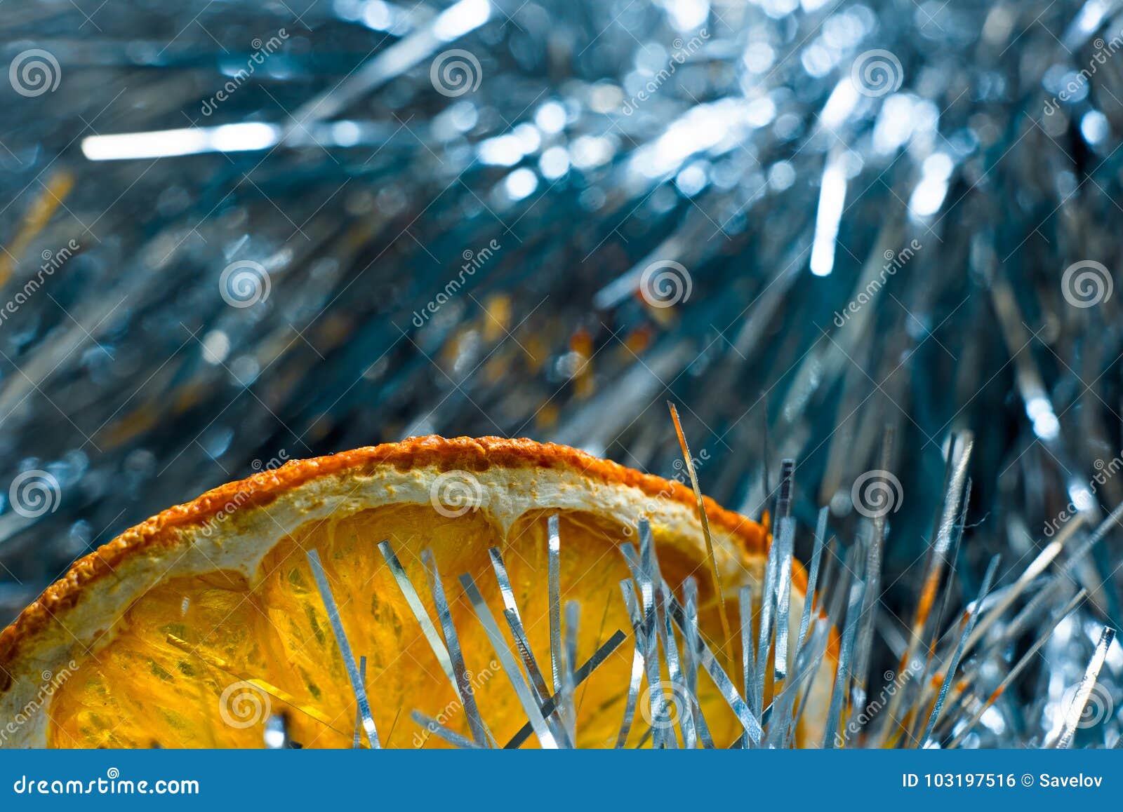Orange Slice in Blue Tinsel Stock Photo - Image of celebration, decor ...