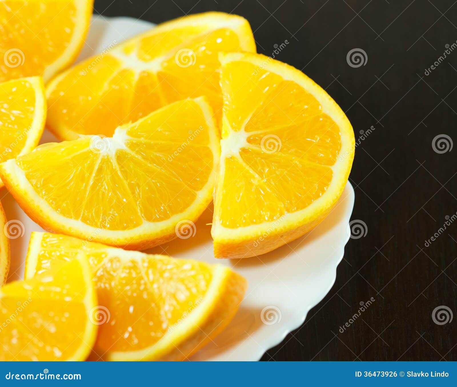Orange slices on a plate stock photo. Image of healthy - 36473926