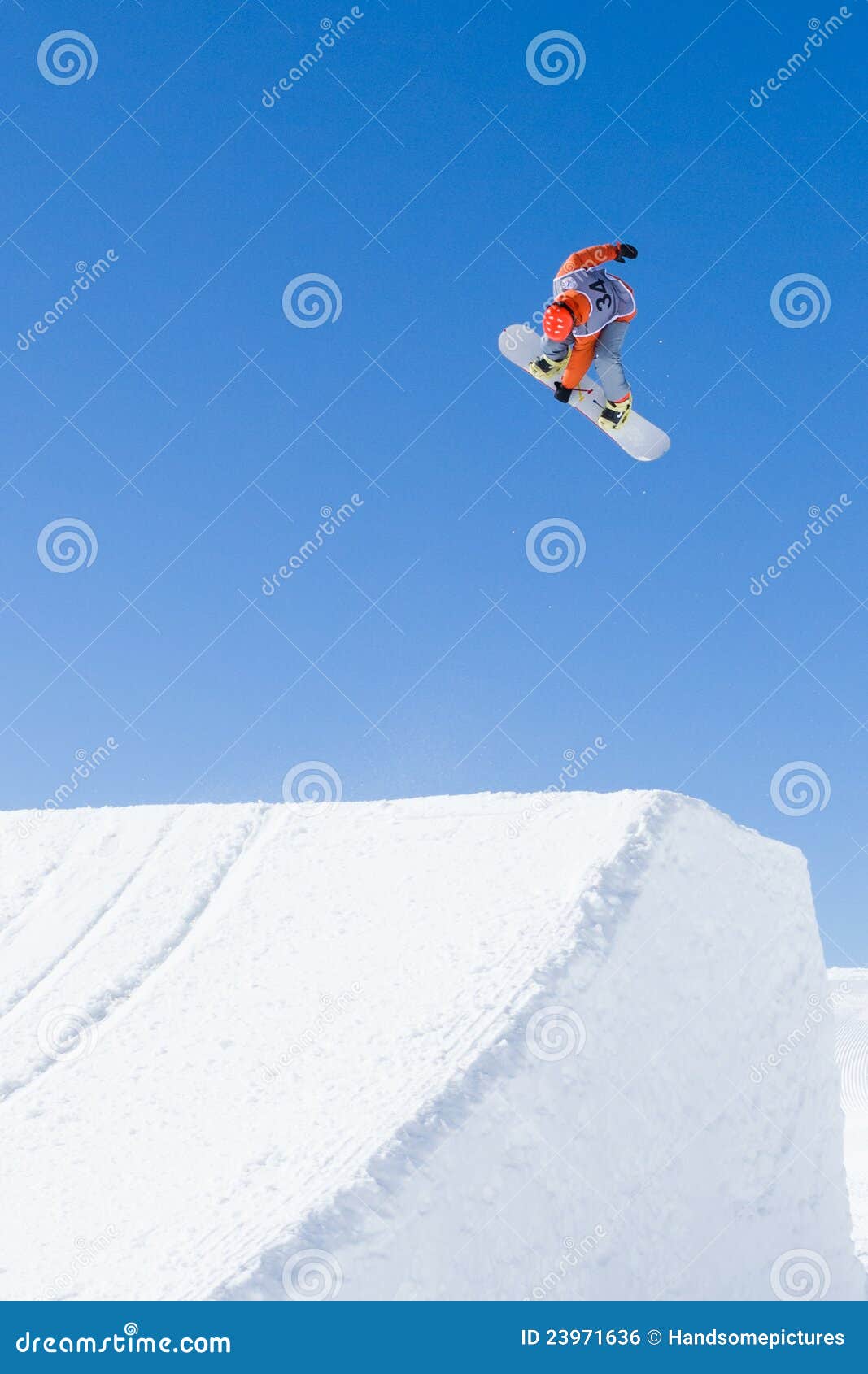 Orange Snowboarder Leaving Ramp Editorial Photo - Image of activity ...