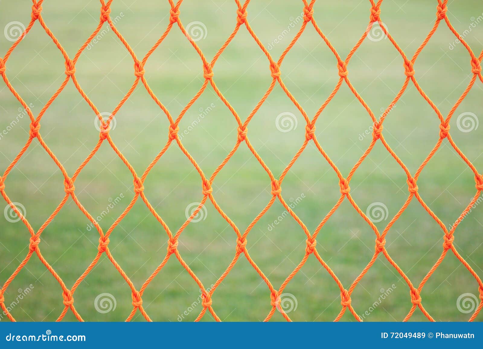 Orange Soccer Net on Green Grass Background Stock Image - Image of ...