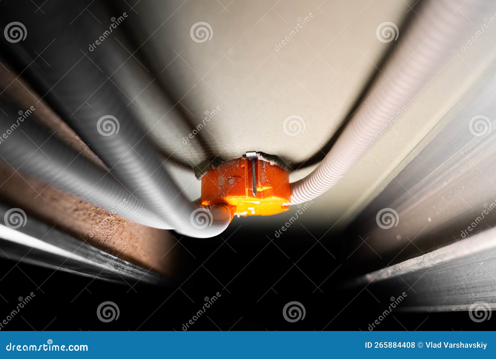 Orange Socket Box in Drywall with Wires in a Protective Corrugated Pipe ...