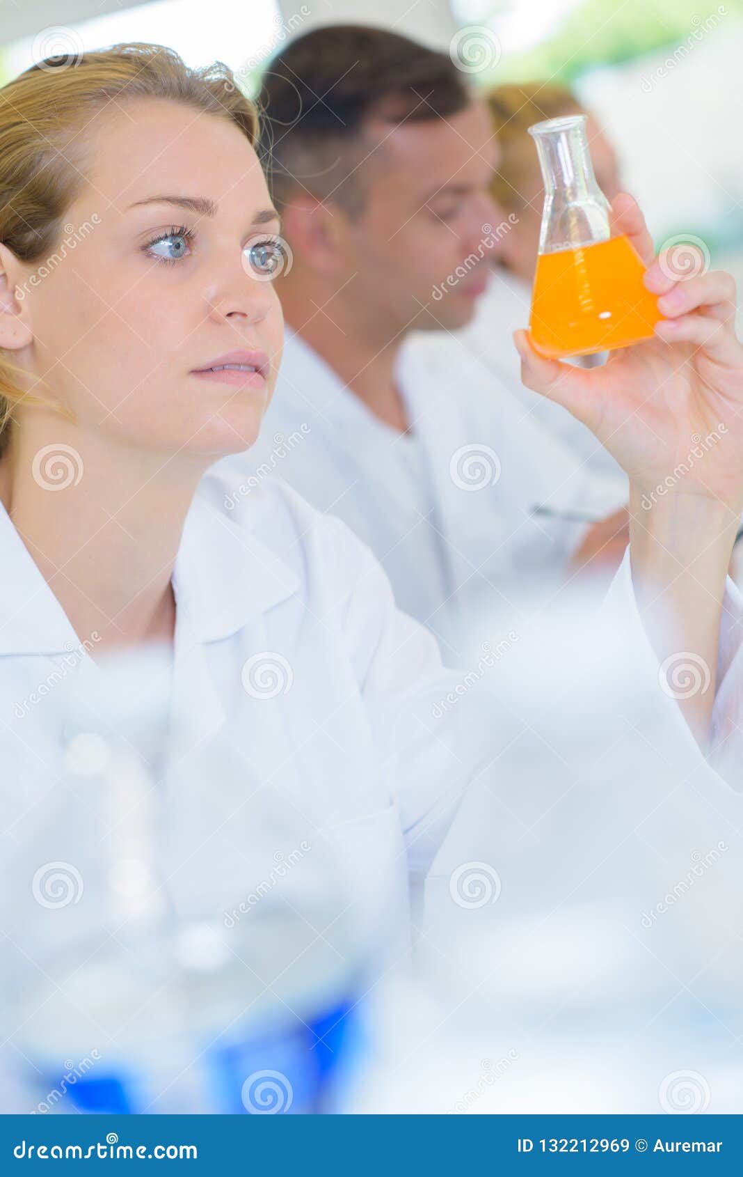 Orange solution in lab stock image. Image of result - 132212969