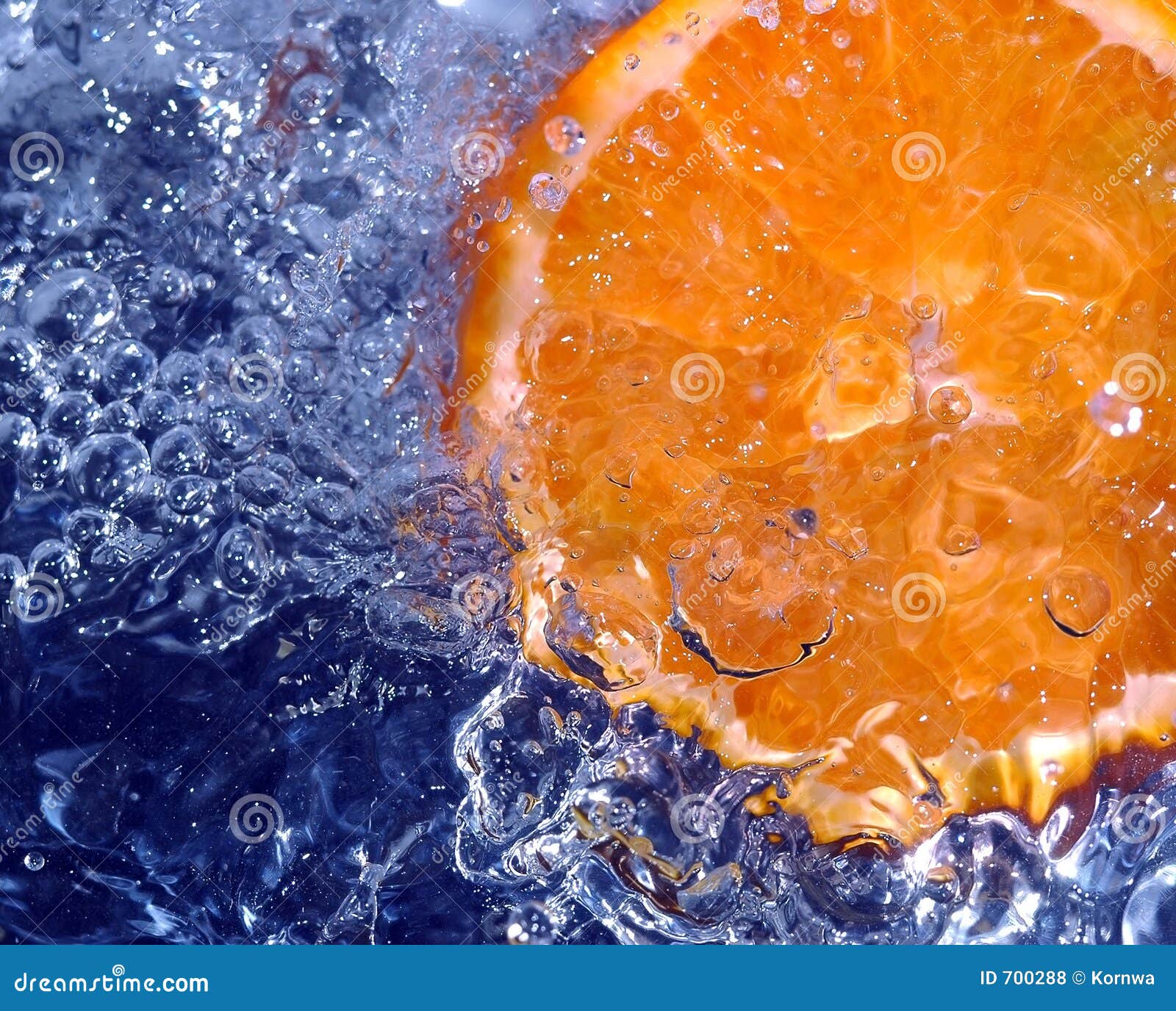 Orange splashing water stock photo. Image of liquid, lager - 700288
