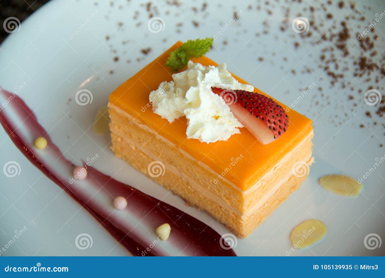 Orange Sponge Cake on a White Plate Stock Image - Image of background ...