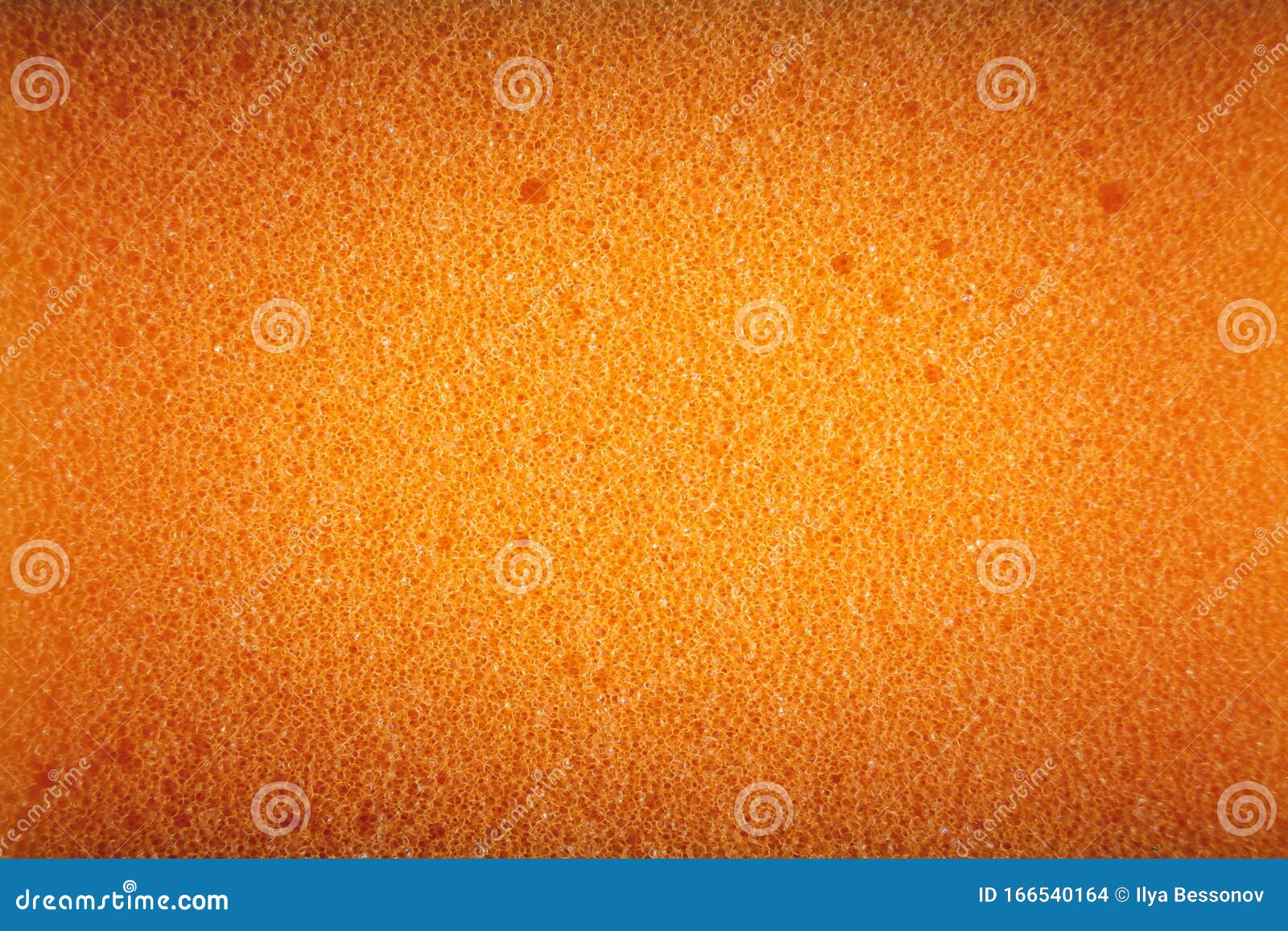 Orange Sponge Made of Microfiber Material. Texture, Background. in ...