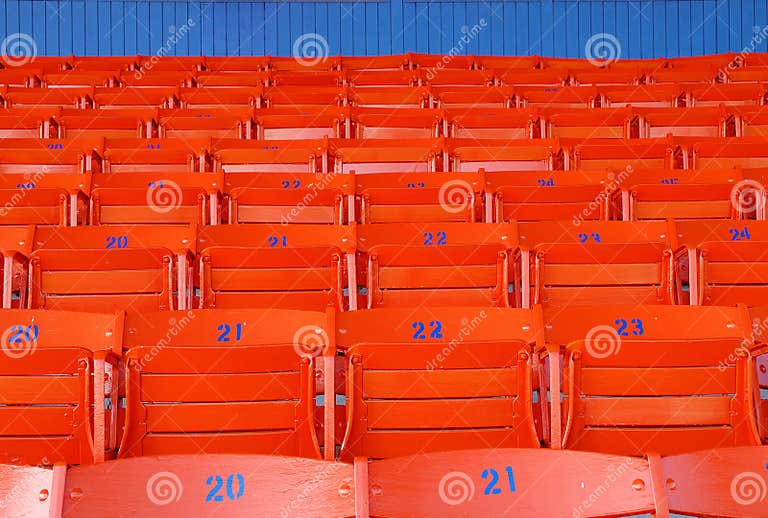 Orange Stadium Seats stock image. Image of step, orange - 22884037