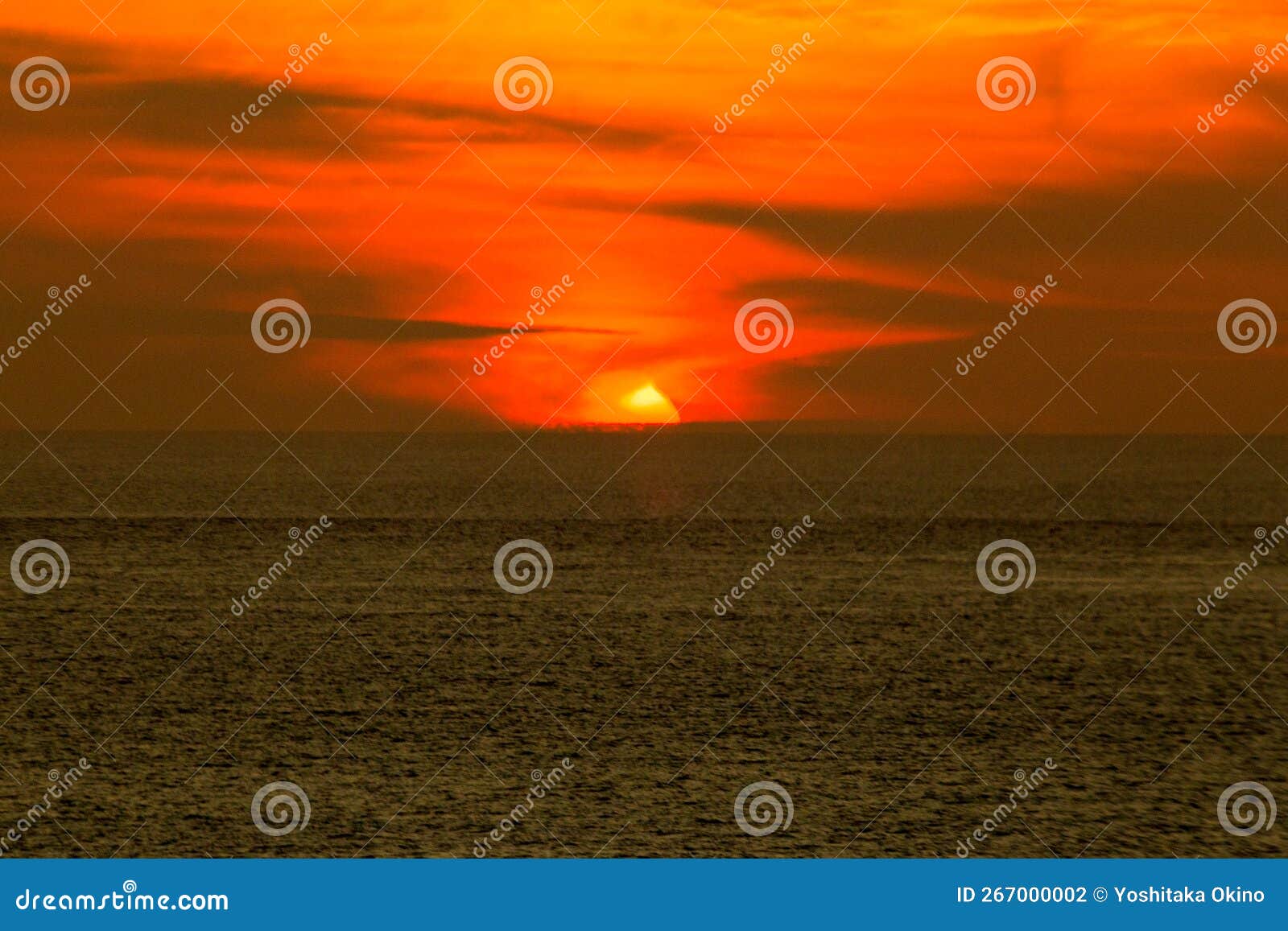 Orange Sun Setting on the Horizon Stock Photo - Image of wave ...