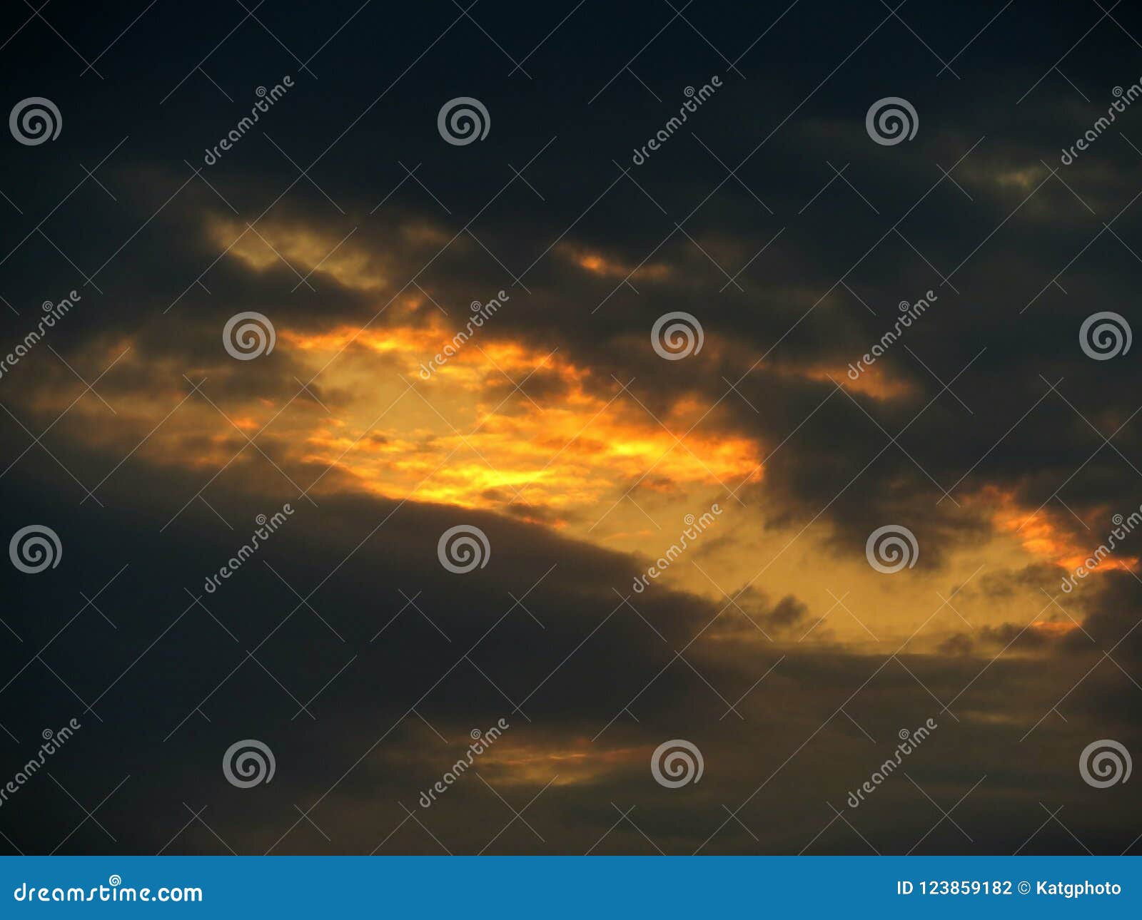 Orange Sunlight Shining through the Night Clouds Stock Photo - Image of ...