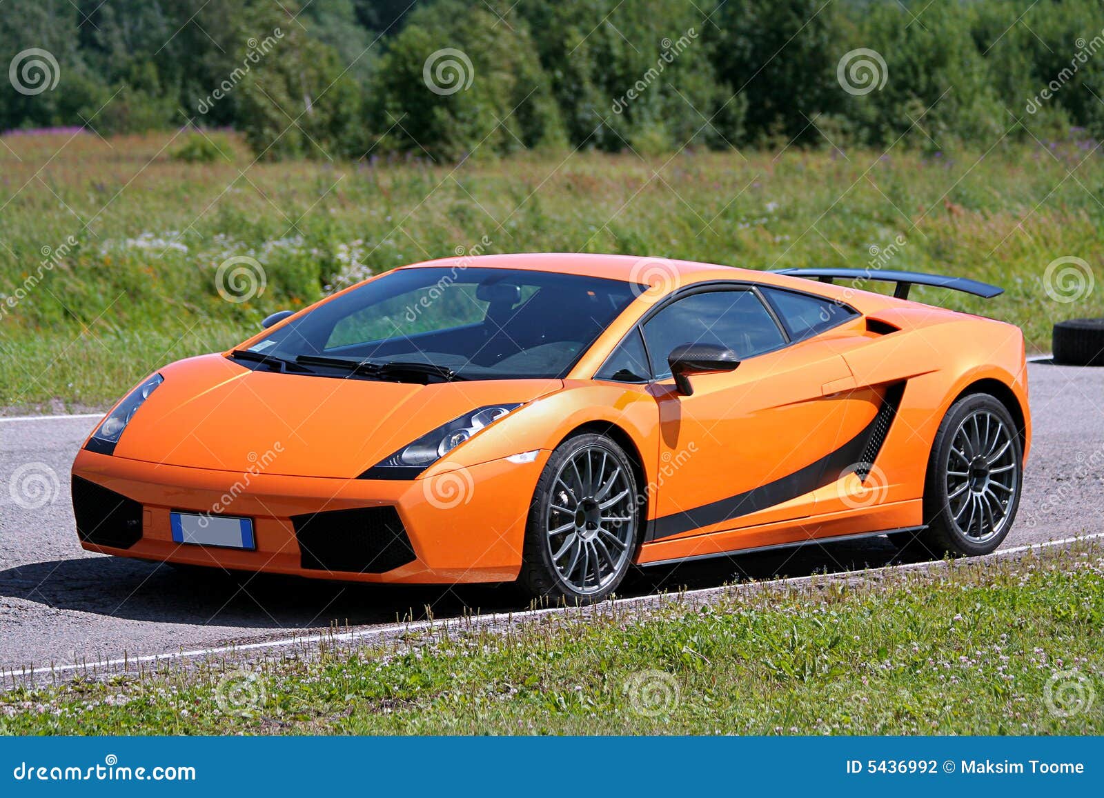 Orange Supercar on a Racetrack Stock Photo - Image of prestige ...
