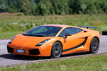 Orange Supercar on a Racetrack Stock Photo - Image of prestige ...