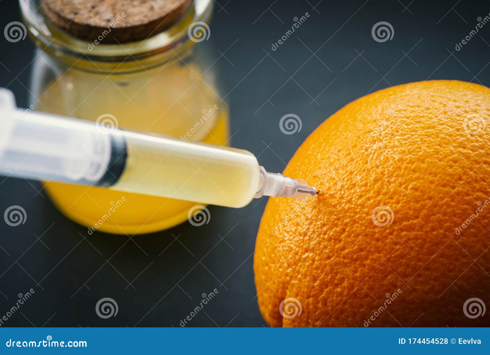 Orange with syringe. stock photo. Image of diet, fruit - 174454528