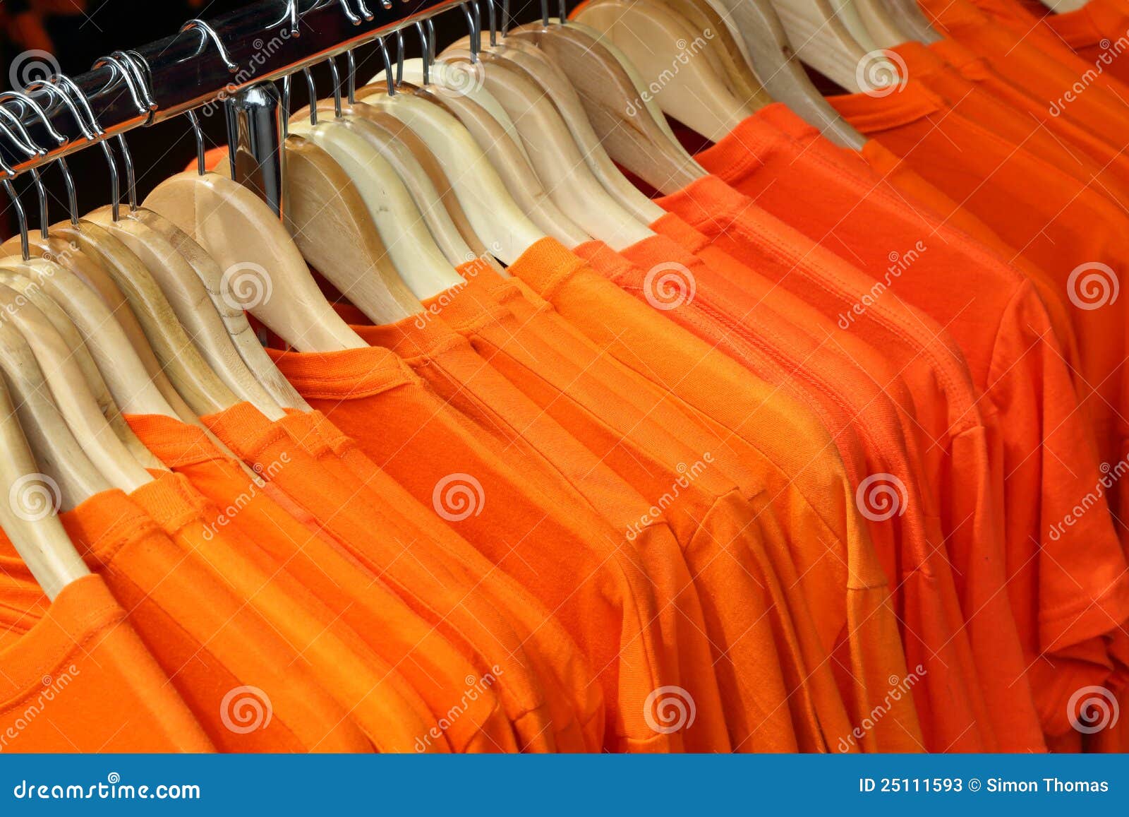 Orange T Shirts stock image. Image of shop, rack, clothing - 25111593