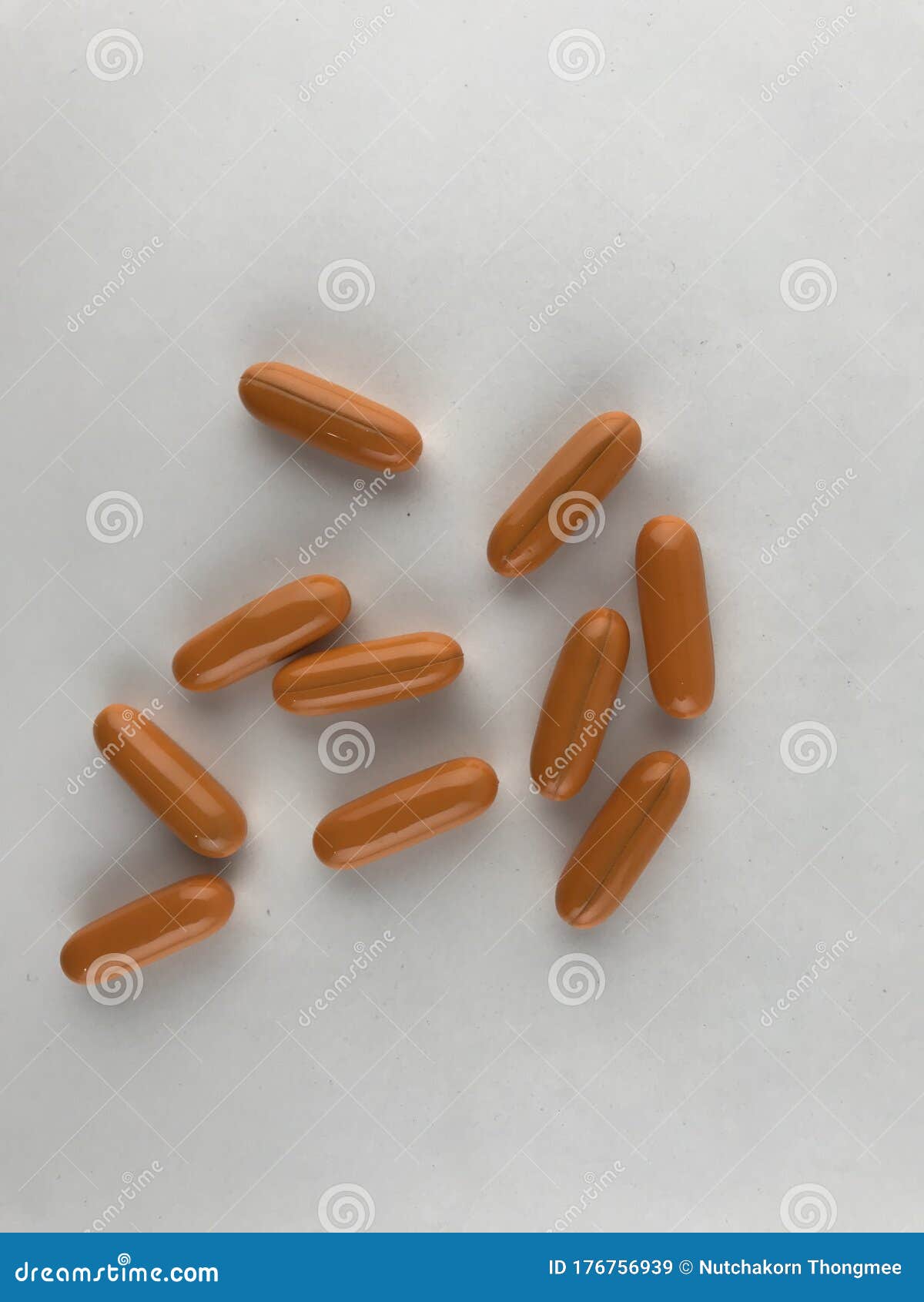 Tablets of Orange Color, Long, Slender, Placed in Bulk. Stock Image ...
