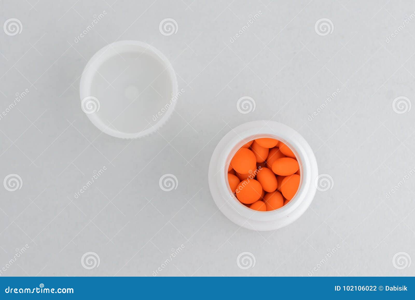 Orange Tablets in a Plastic Bottle on a White Background, the Bo Stock ...
