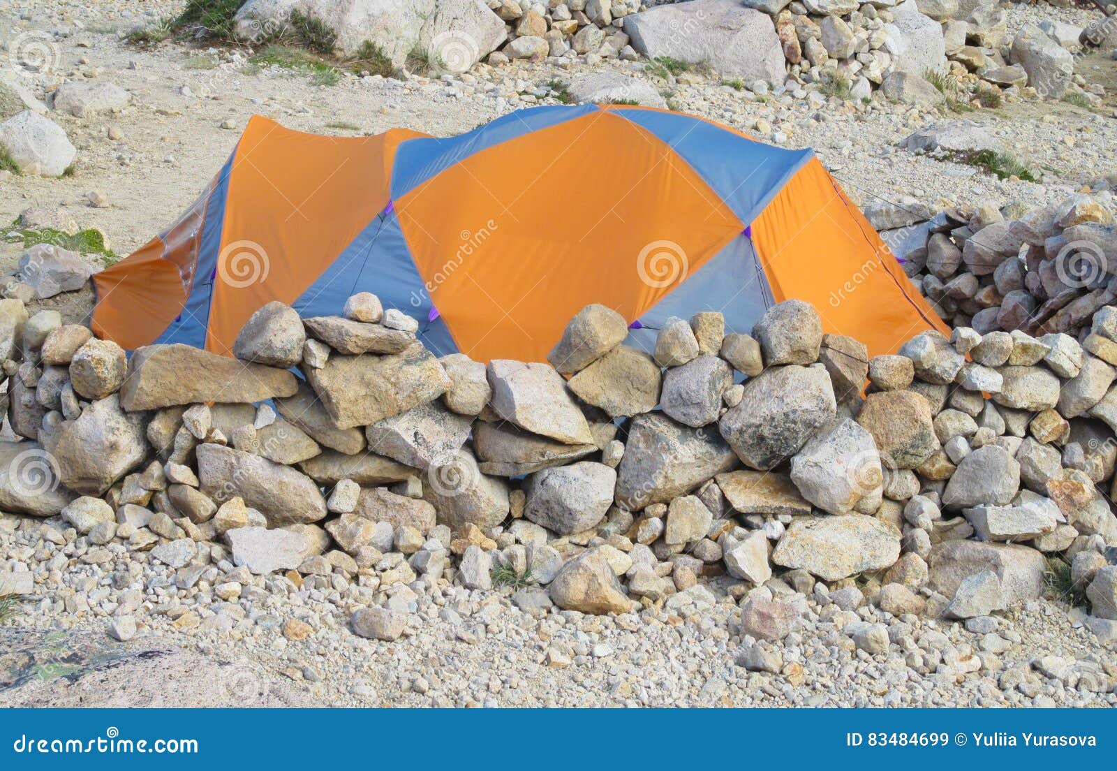 Orange Tent on the Rocks in the Mountains Stock Image - Image of ...