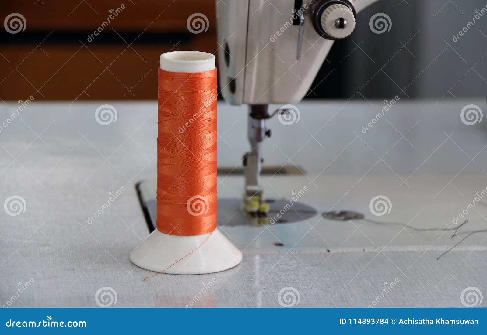 Orange Thread in the Thread Roll Put Vertical on the Sewing Machine ...