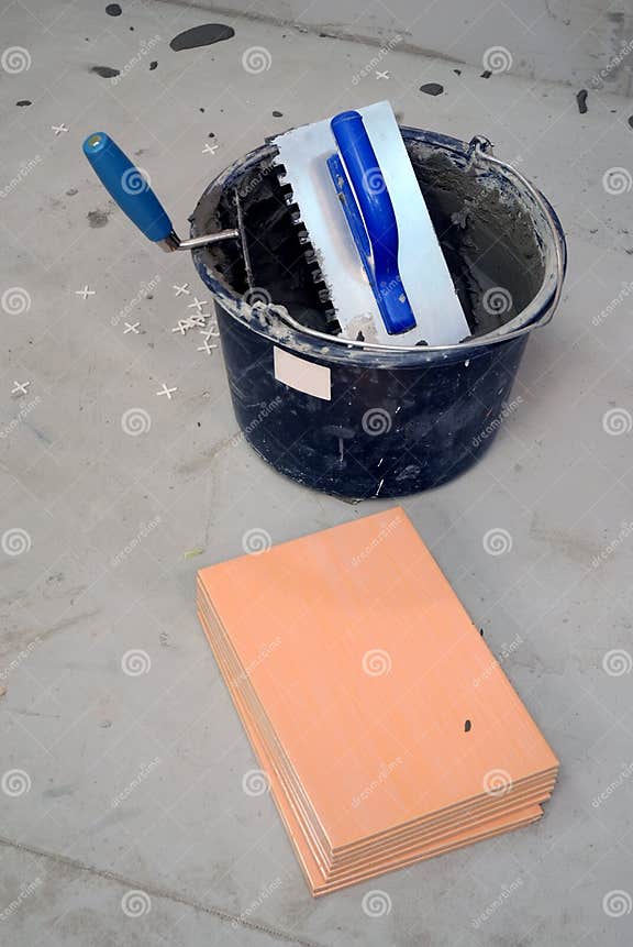 Orange tiles with bucket stock photo. Image of decoration - 2717854