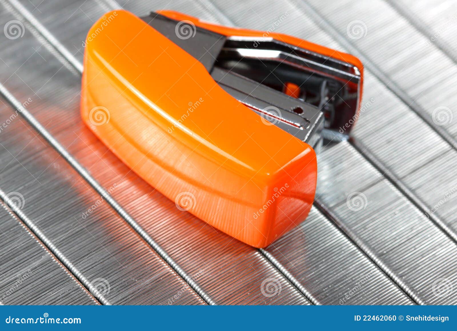 Orange tiny stapler stock photo. Image of staples, background - 22462060