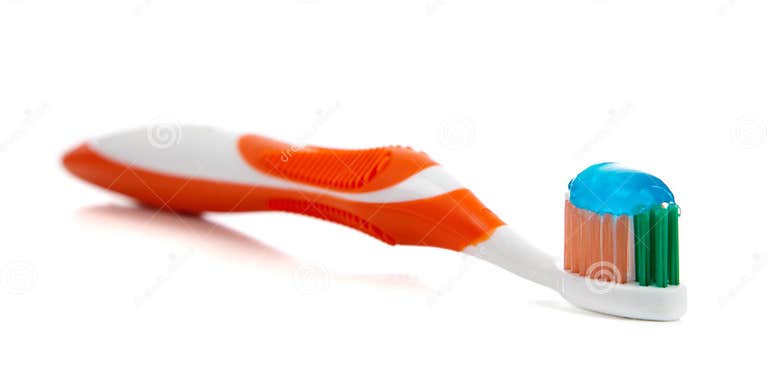 Orange Toothbrush and Toothpaste on White Stock Photo - Image of paste ...