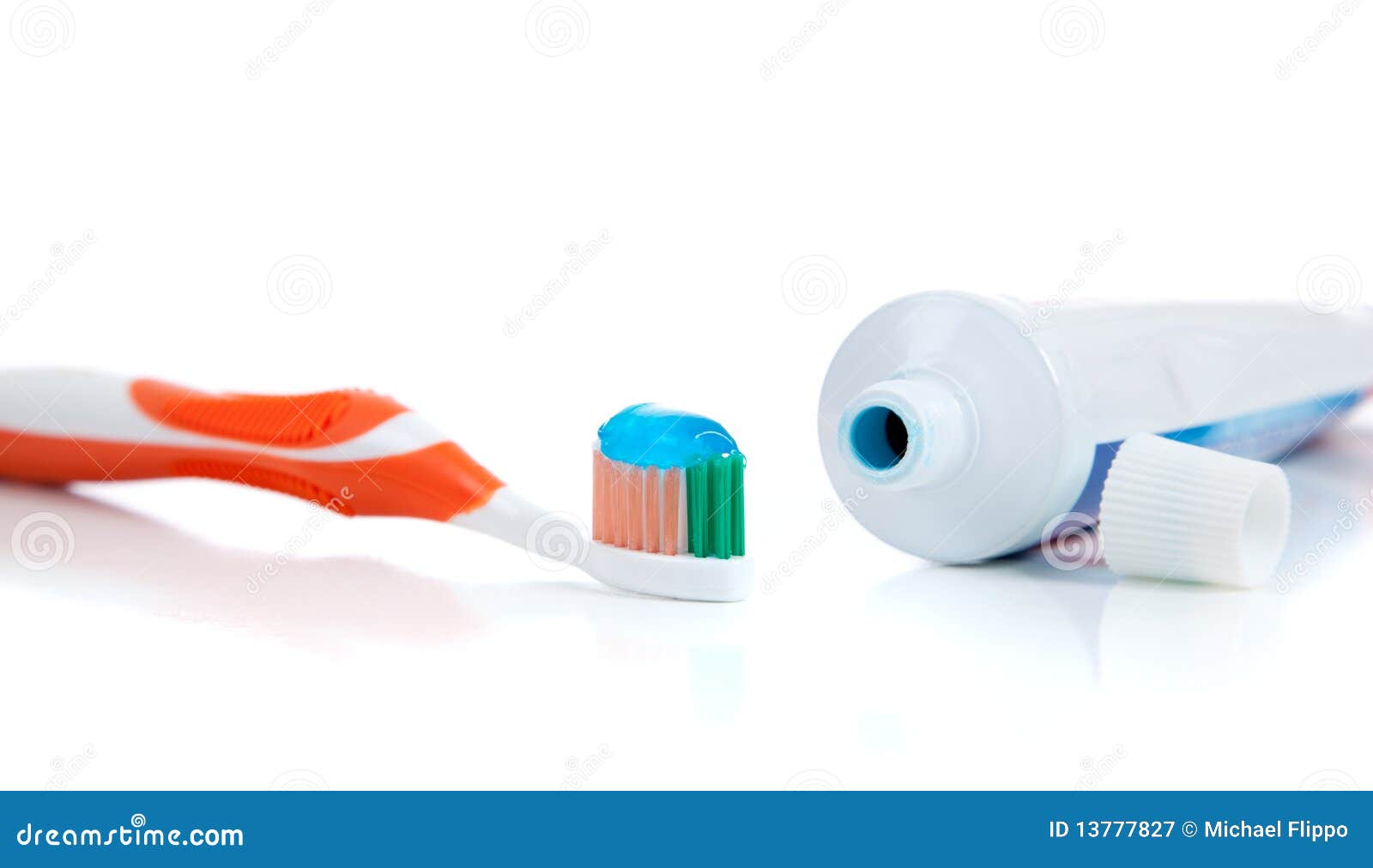 Orange Toothbrush with Toothpaste on White Stock Image - Image of ...