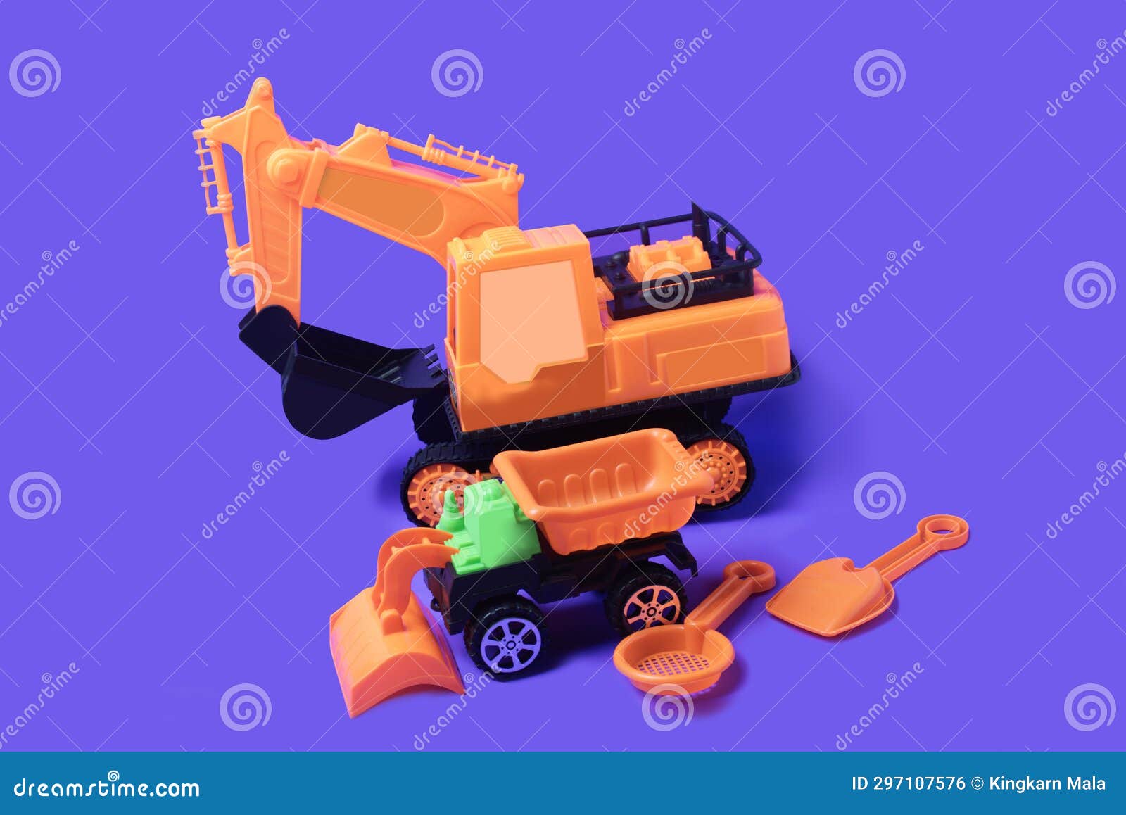 Orange Toy Backhoe and Toy Loader on a Purple Background Stock Photo ...