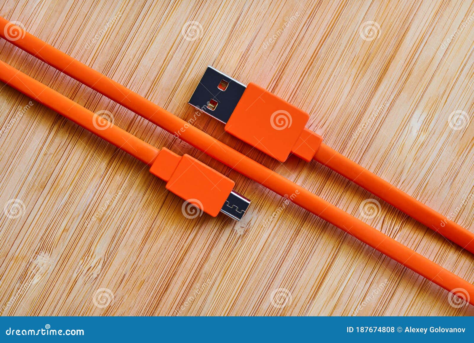 Orange USB Cable for Gadgets on a Wooden Background Stock Photo - Image ...