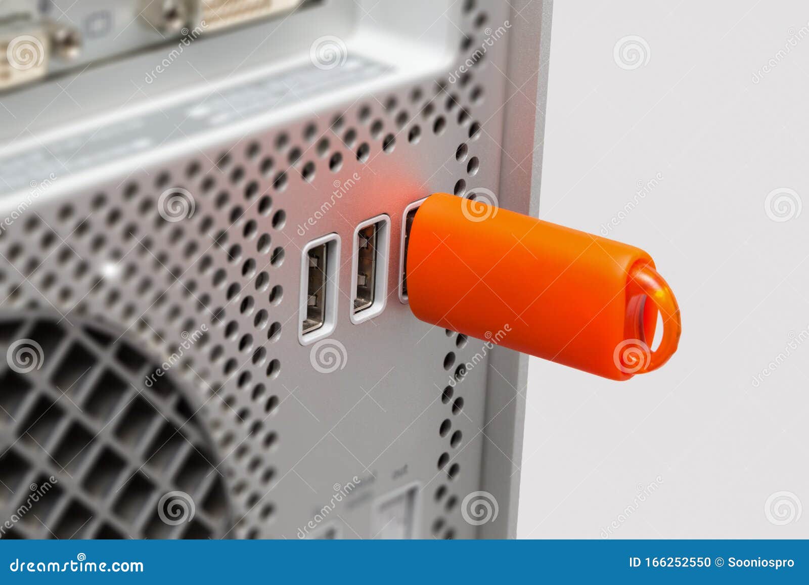 Orange USB Flash Drive Connecting To Desktop Computer Stock Photo ...