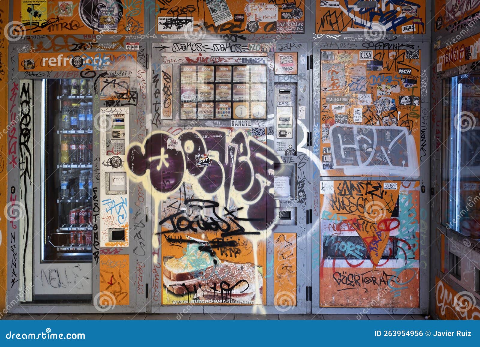 Orange Vending Machines Completely Vandalized and Full of Graffiti and ...