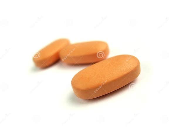Orange vitamin pills stock photo. Image of orange, tablet - 26942258