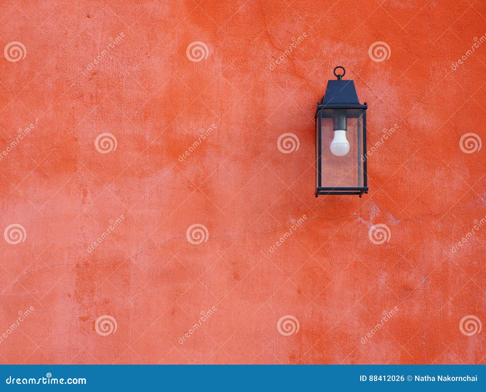 Orange wall with lamp stock photo. Image of color, lamp - 88412026