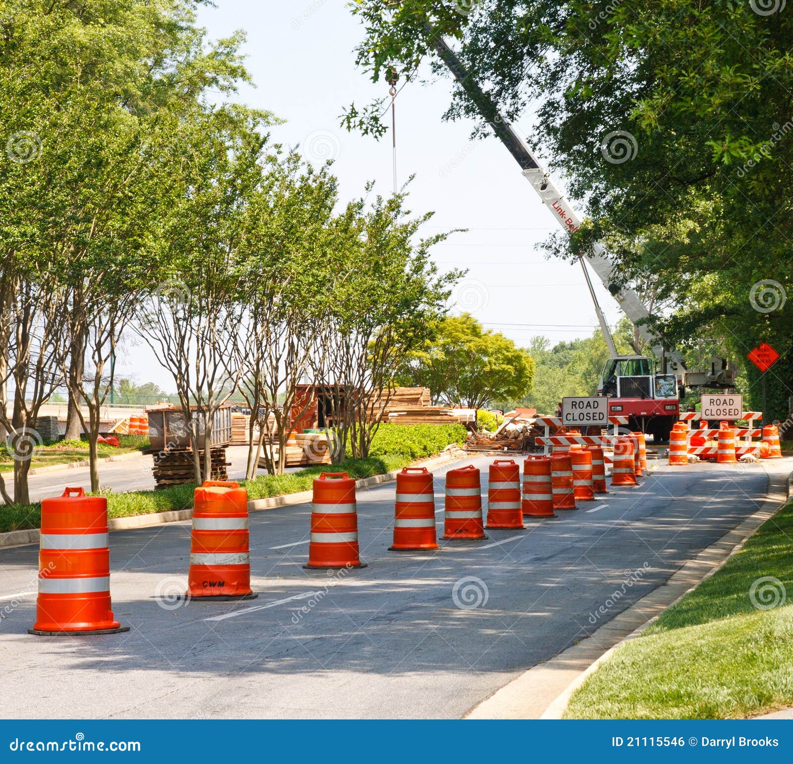 Orange and White Barrels in Road Construction Stock Photo - Image of ...