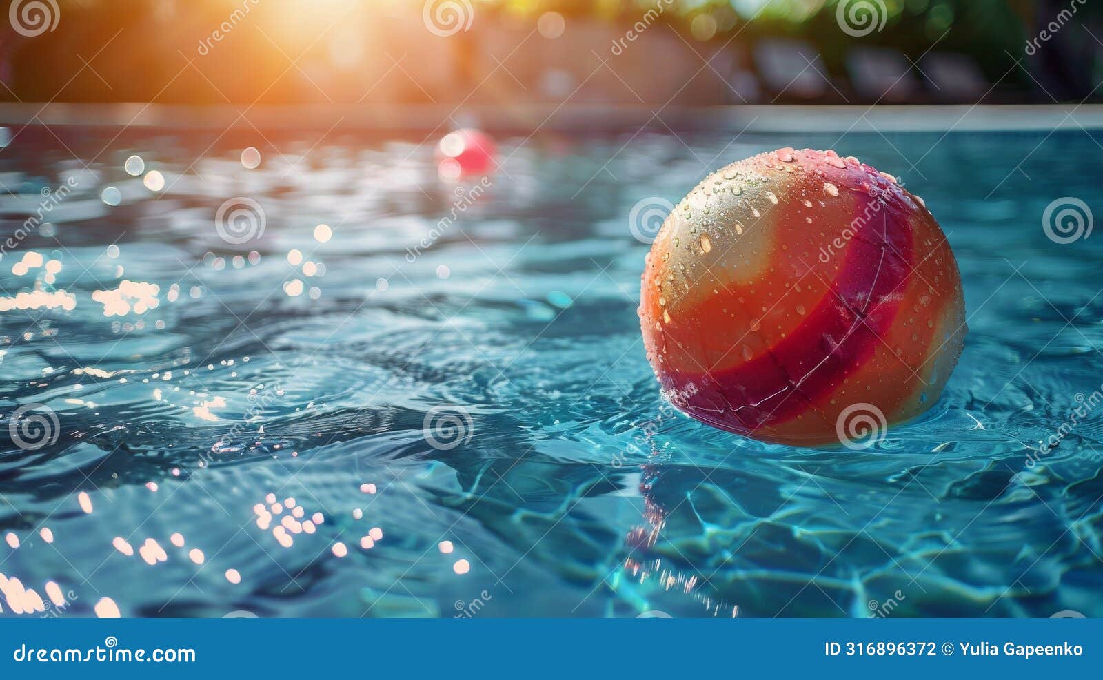Orange and White Beach Ball Floating in Pool Stock Photo - Image of ...