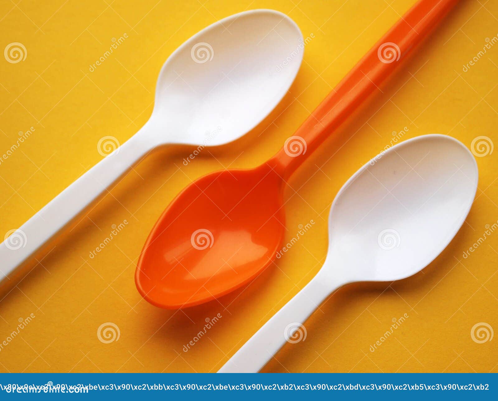 Orange and White Pastic Spoons Stock Photo - Image of dishware, orange ...