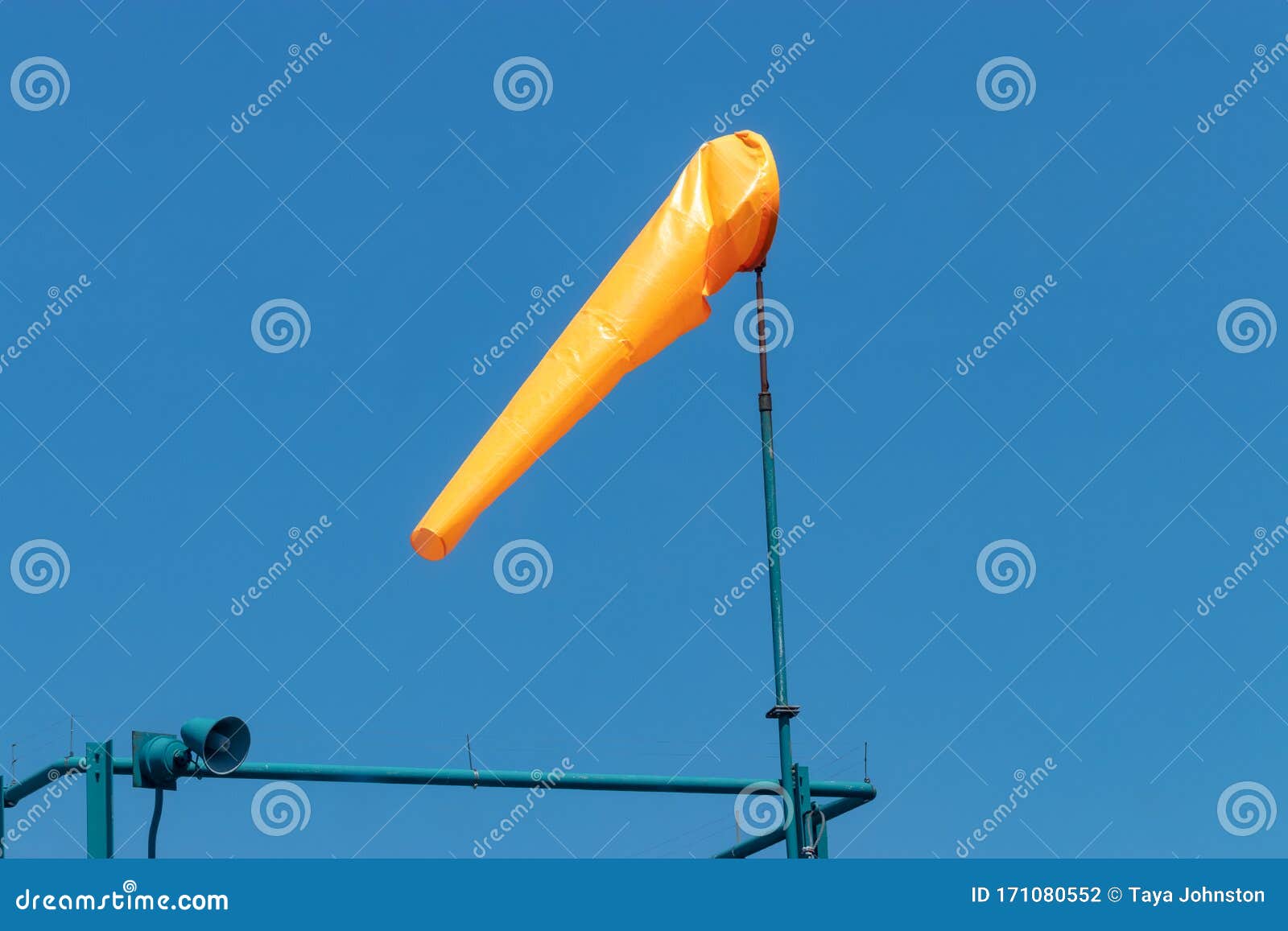 Orange Wind Sock Blowing in the Sunlight in Springtime Stock Photo ...