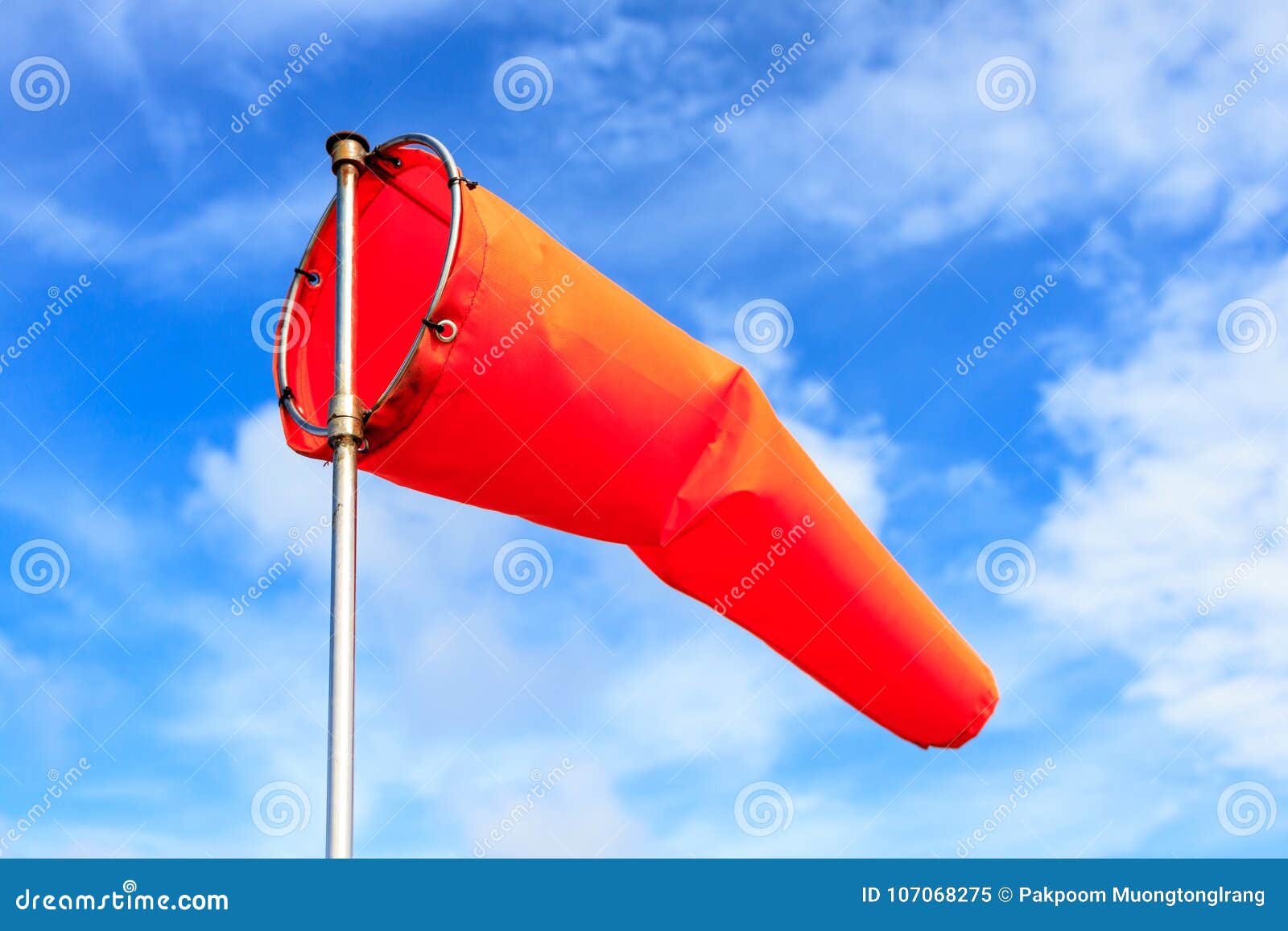 Orange Wind Sock in Blue Sky and White Cloud Background. Stock Image ...