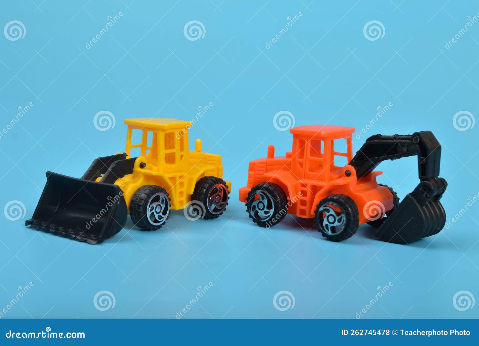 An Orange and Yellow Backhoe Loader Isolated on a Blue Background Stock ... An Orange and Yellow Backhoe Loader Isolated on a Blue Background Stock ...