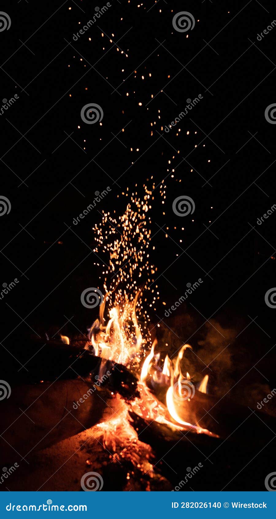 Orange and Yellow Glowing Fire Burning in a Contained Area Stock Photo ...