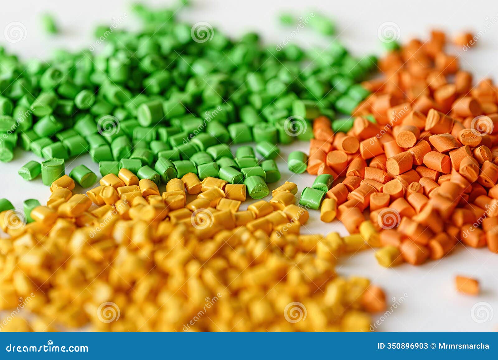 Orange, Yellow and Green Plastic Pellets Stock Image - Image of blue ...