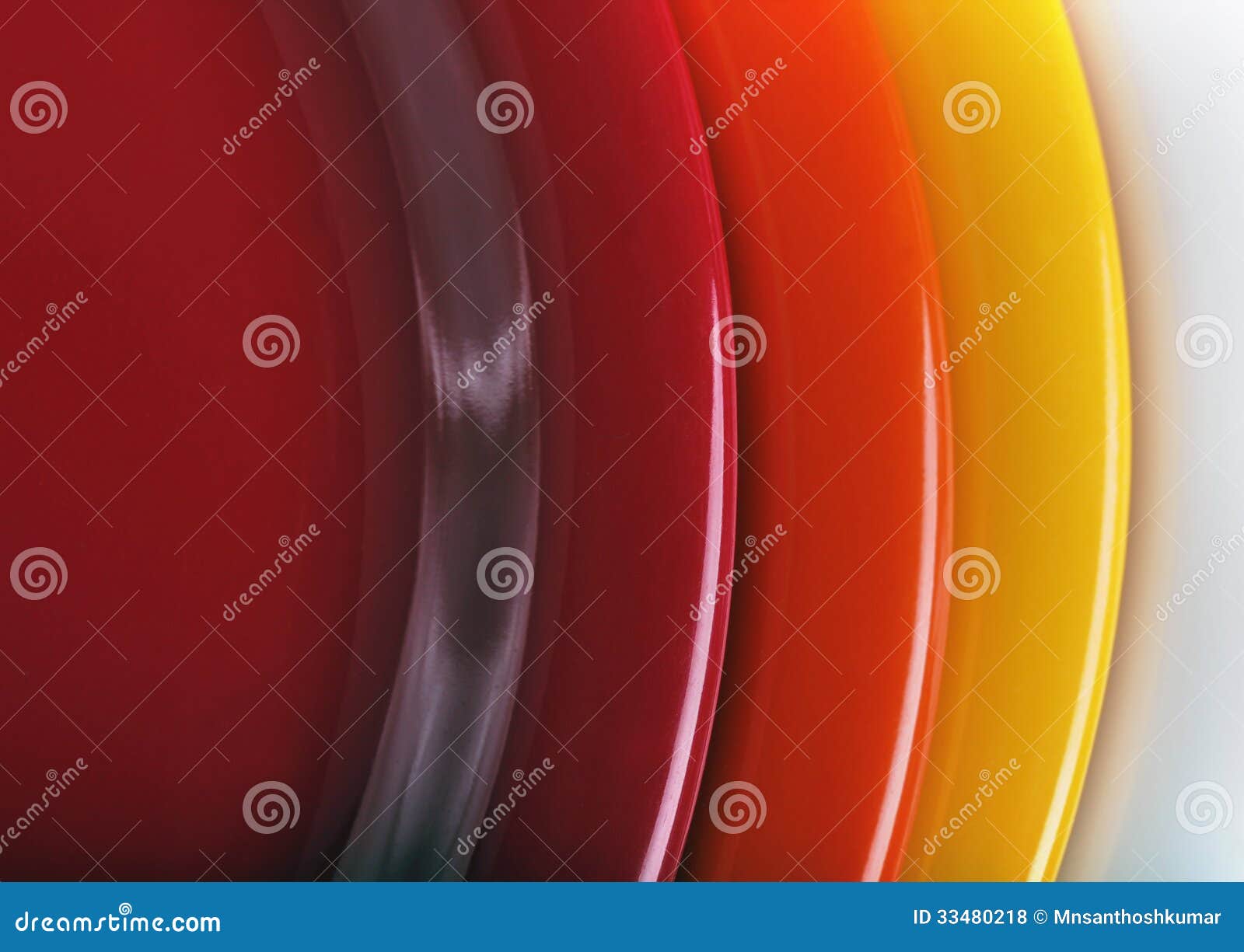 Orange, Yellow and Red Colored Plates Stacked upon Each Other Stock ...