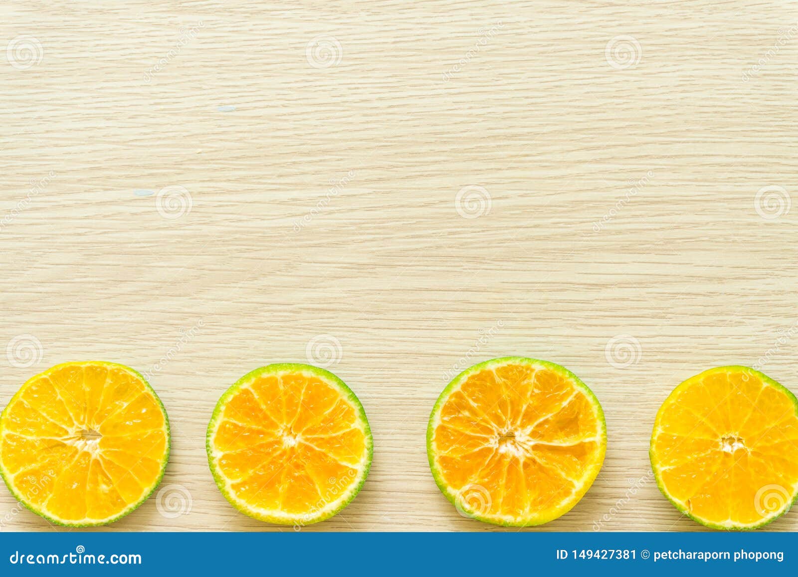 Oranges Cut in Half on a Wooden Background, Free Space Stock Image ...