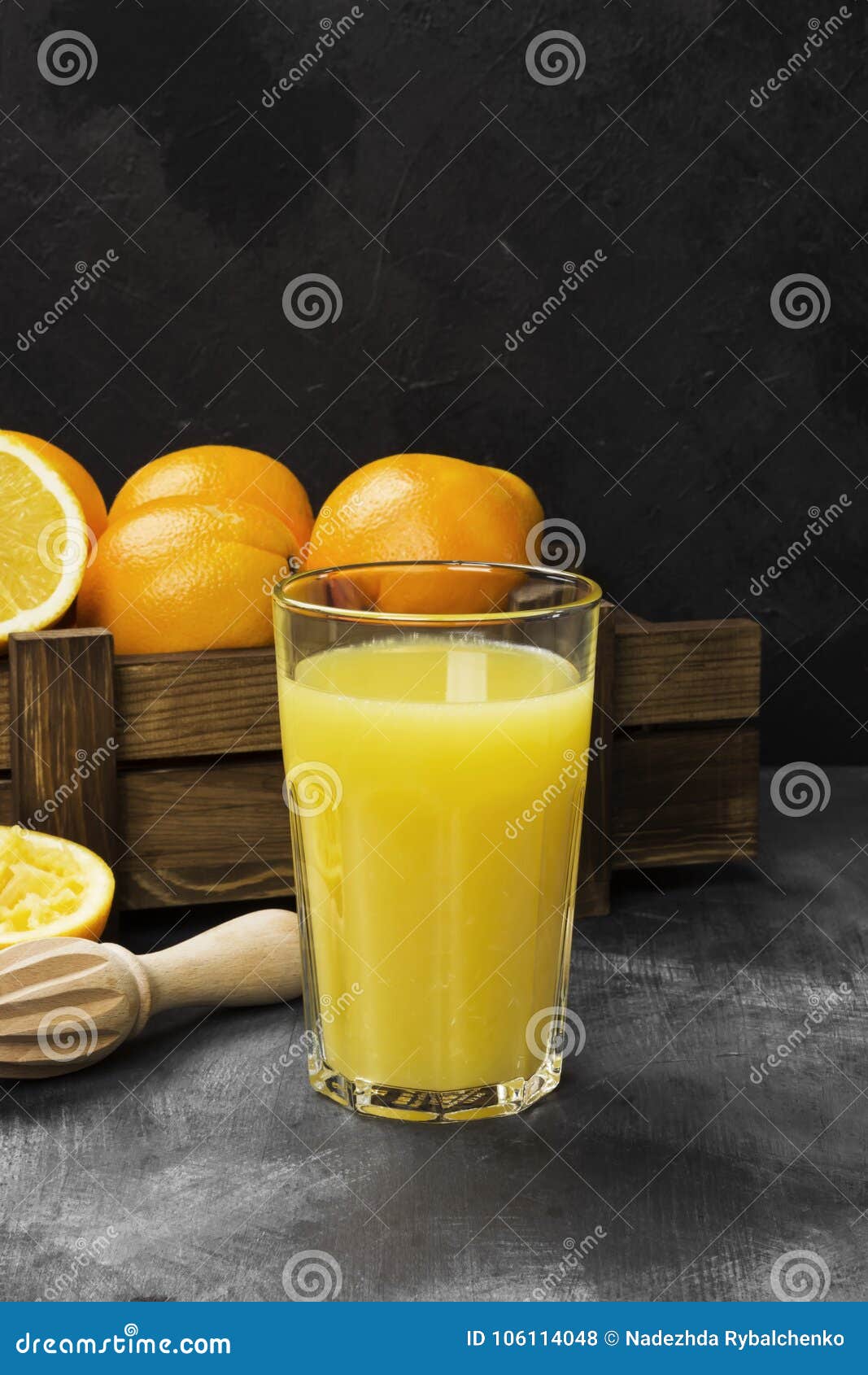 Oranges and Fresh Orange Juice on a Black Background Stock Photo ...