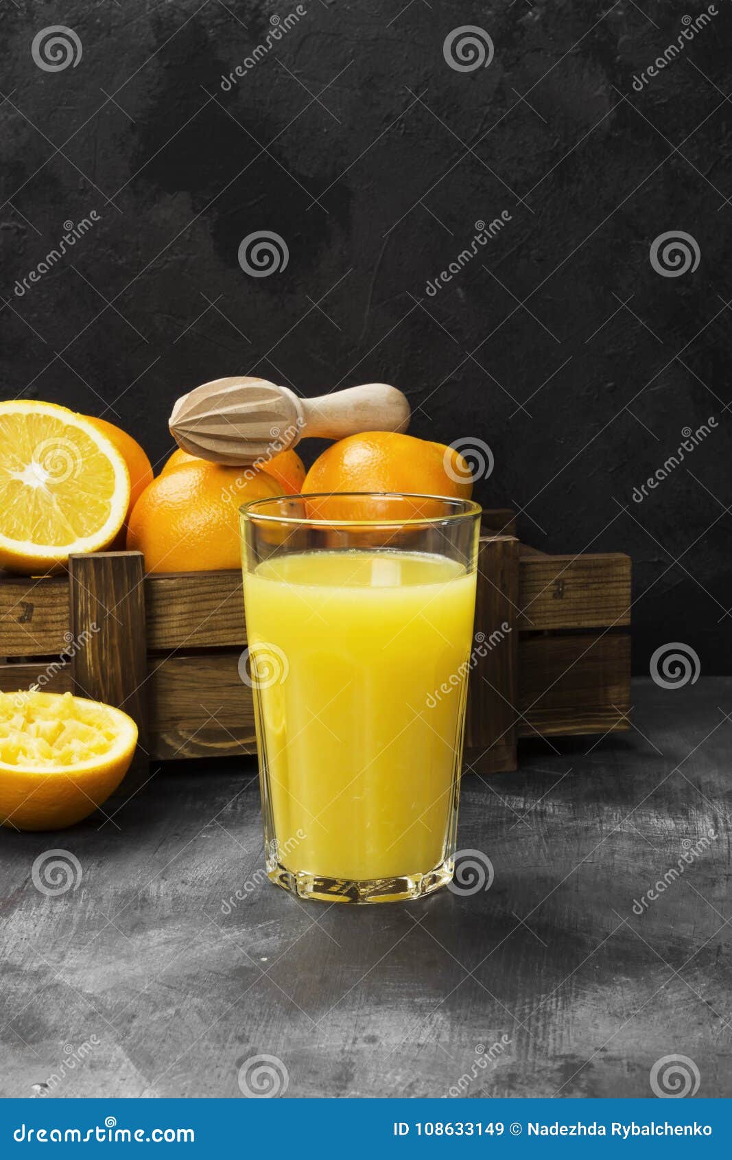 Oranges and Fresh Orange Juice on a Black Background Stock Image ...