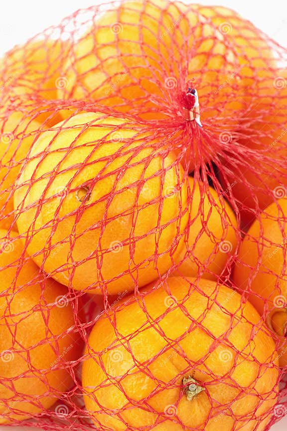 Oranges in a net stock photo. Image of food, oranges - 22230674
