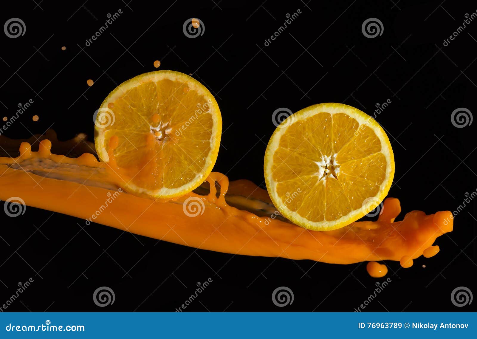 Oranges and Orange Juice Splash on a Black Background Stock Image ...