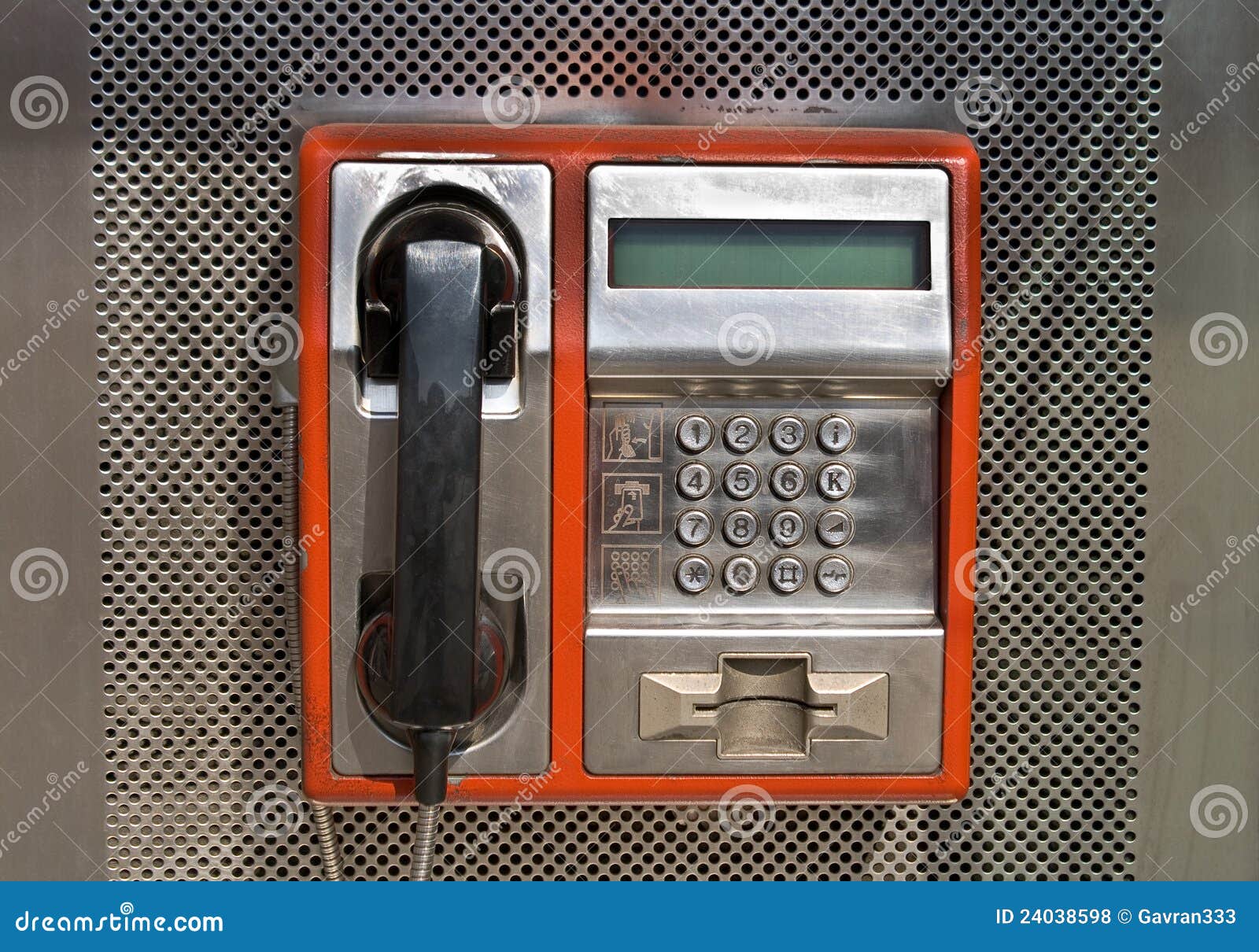 Oranje openbare telefoon stock foto. Image of modern - 24038598