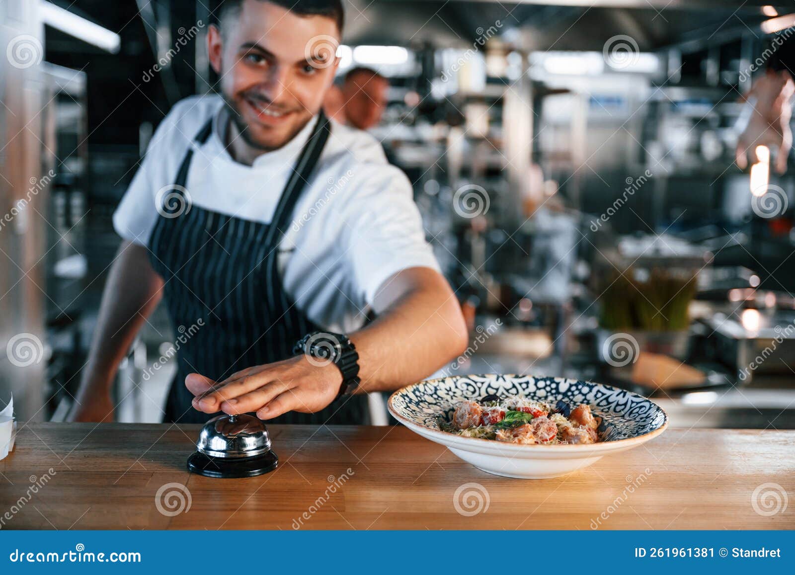 Order is Complete. Kitchen Workers is Together Preparing the Food Stock ...