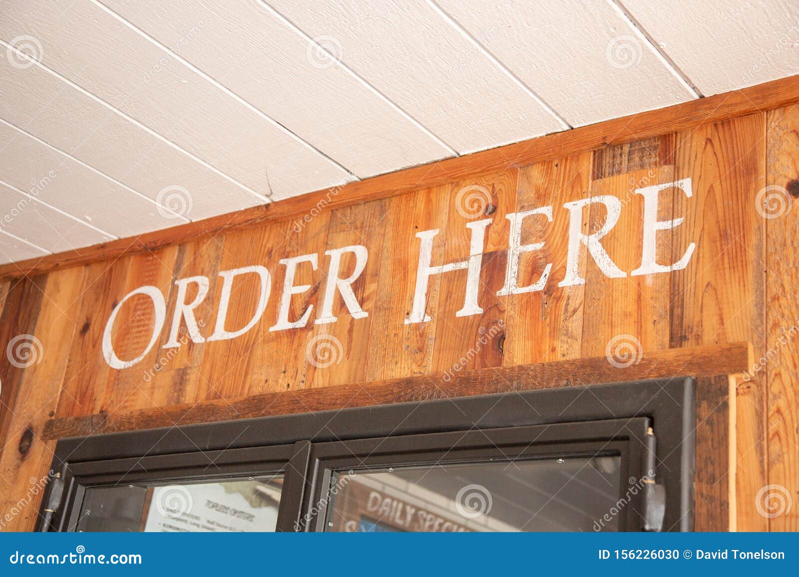 Order Here restaurant sign editorial image. Image of name - 156226030