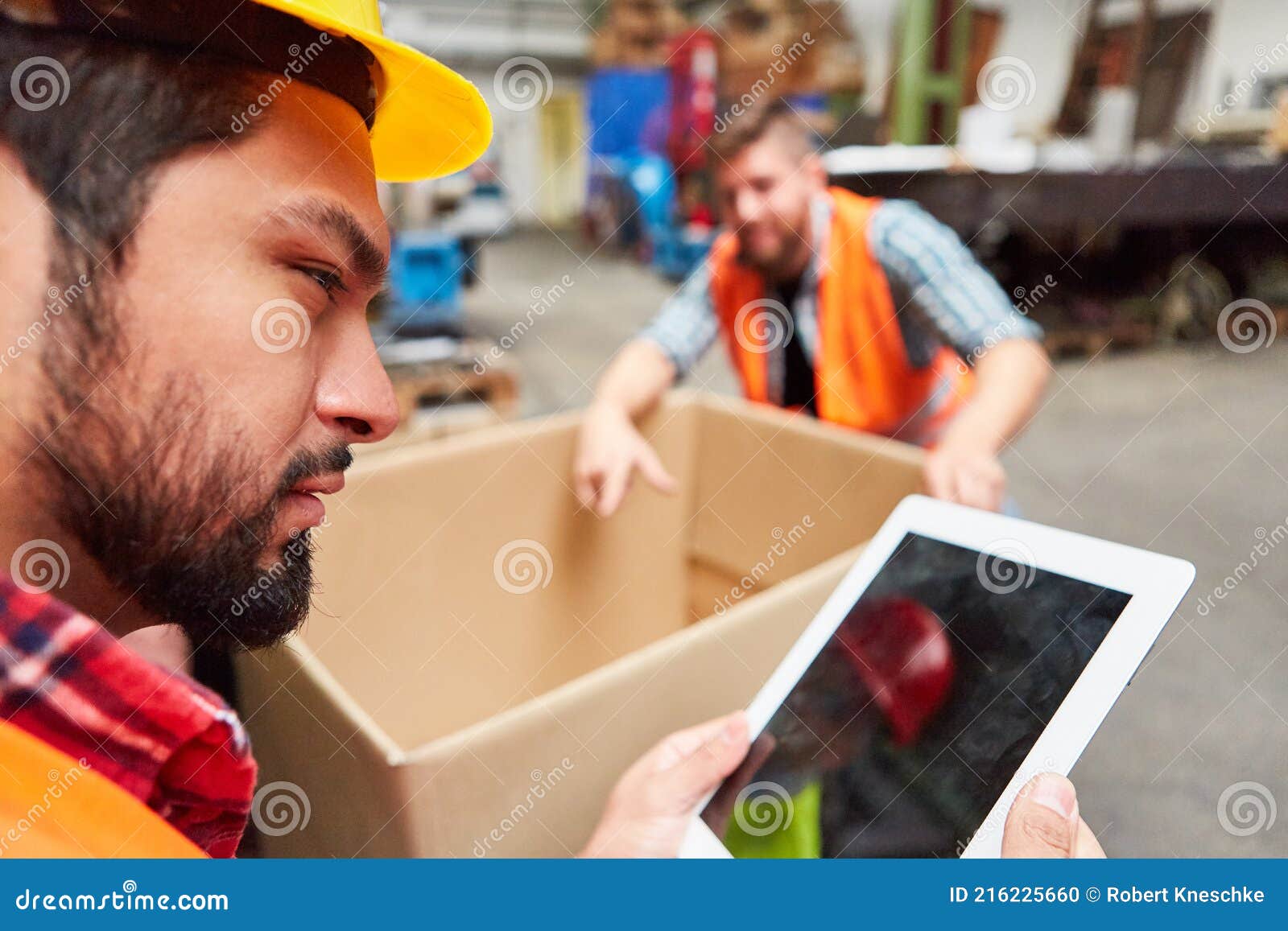 Order Picker Checks Incoming Goods on the Tablet Computer Stock Photo ...