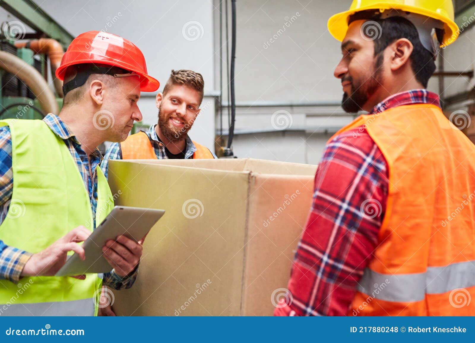 Order Picker with Tablet Computer Checks Cardboard Box Stock Photo ...