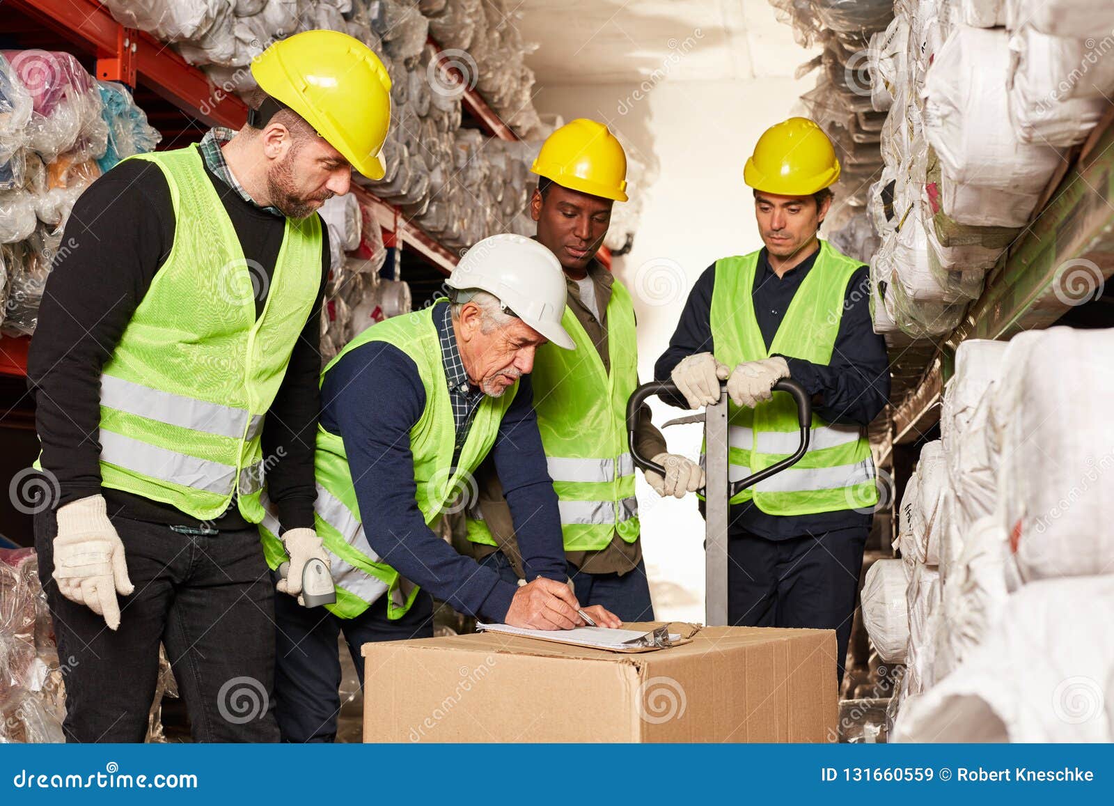 Order Pickers and Logistics Workers Control Delivery in the Warehouse ...